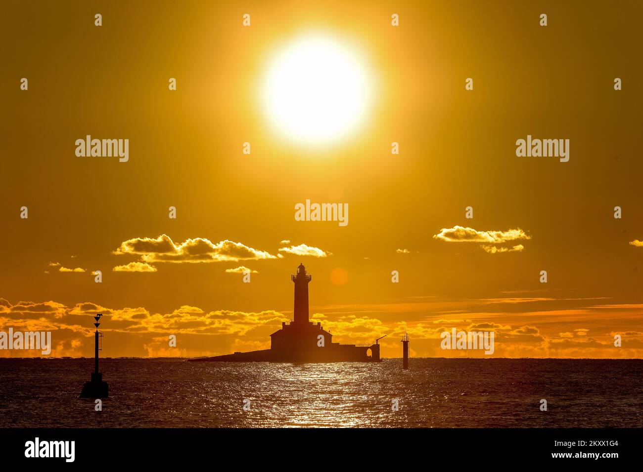 Photo taken on January 07, 2022 shows the Porer lighthouse at sunset, near Premantura, Croatia ...