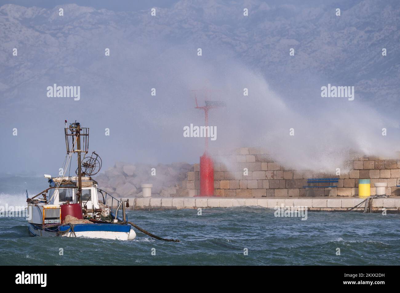 Boat at sea seen during windy day, in Razanac, Croatia, on January 10 ...