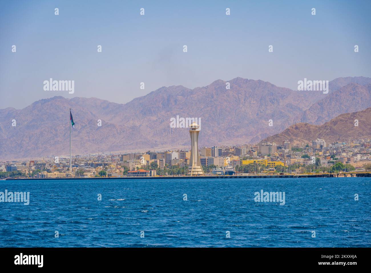 Aqaba from the Red Sea with the port tower and the Arab revolt flagpole ...