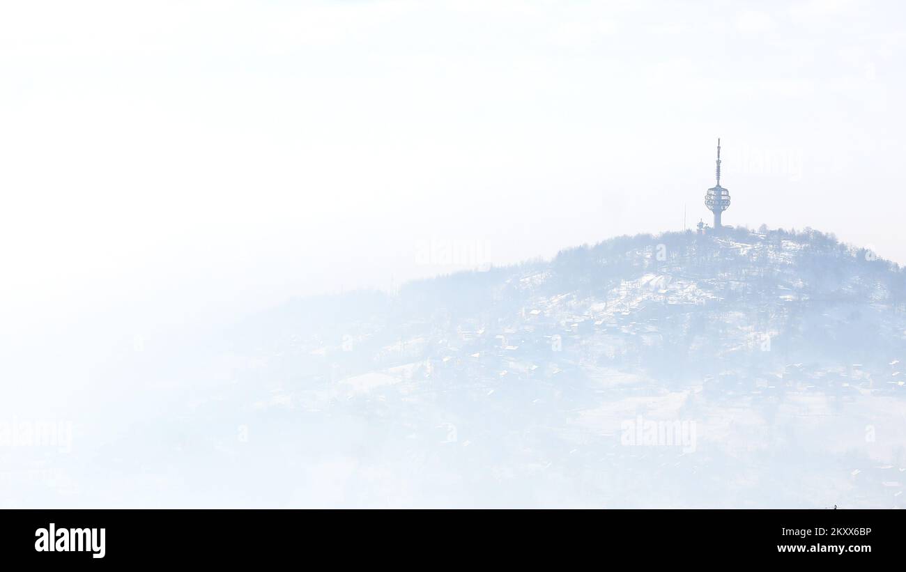 Hum antenna tower breaks through fog and smog in Sarajevo, Bosnia and ...