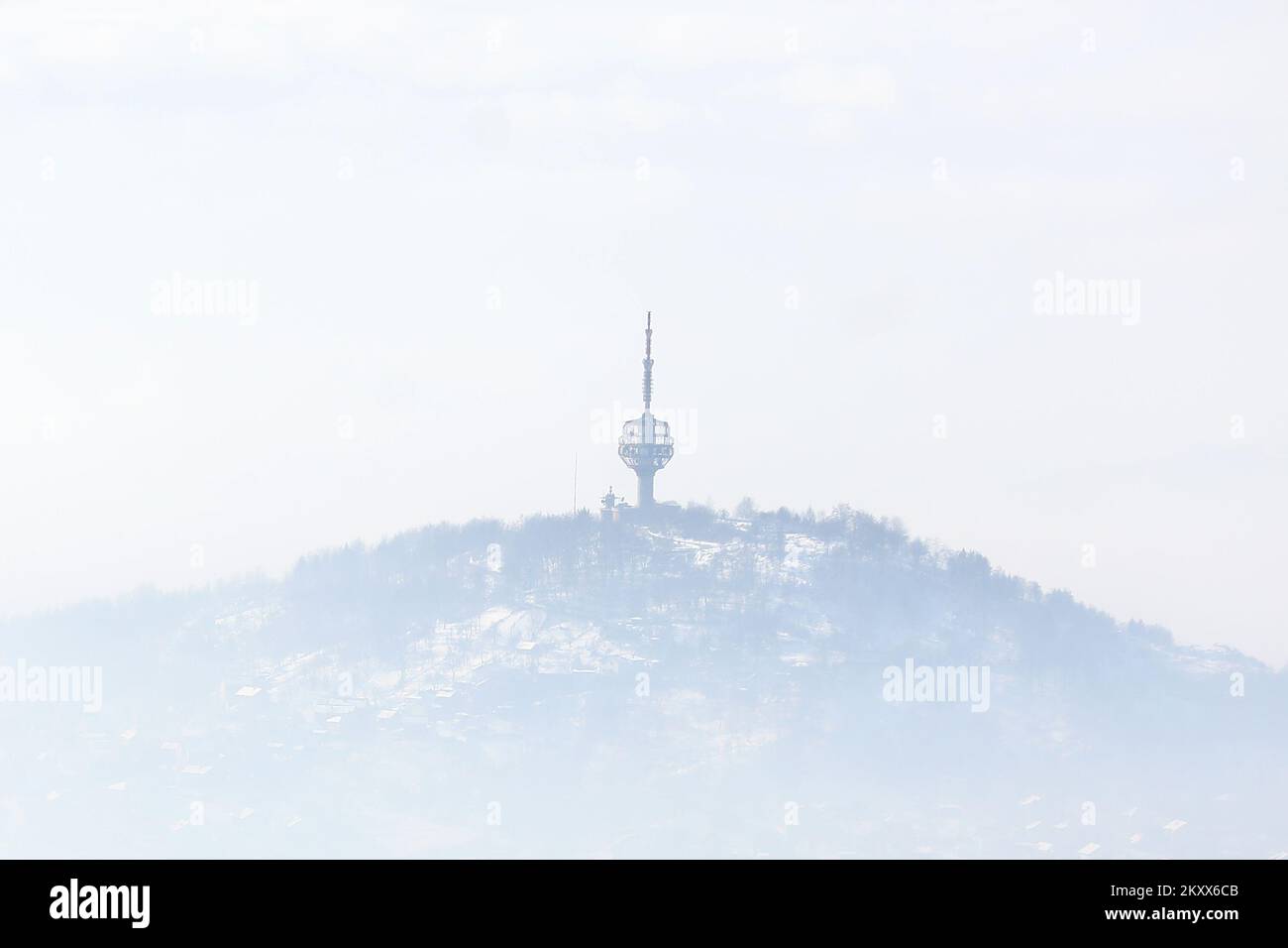 Hum antenna tower breaks through fog and smog in Sarajevo, Bosnia and ...