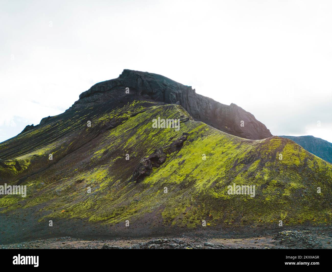 Exploring Iceland highlands in autumn, volcanic rock formations covered ...