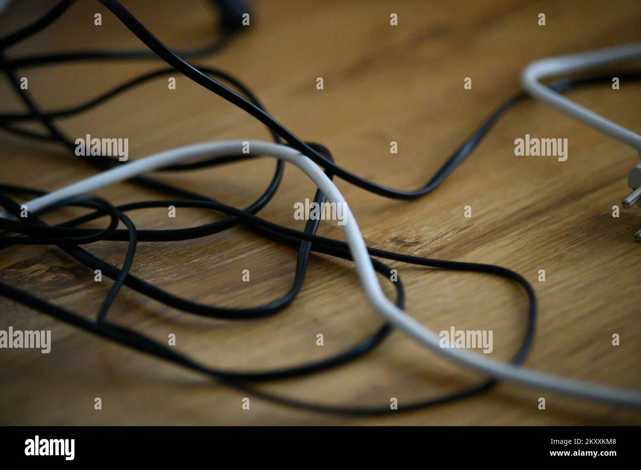 Cable chaos clutter from multiple electric wire extension cords and ...