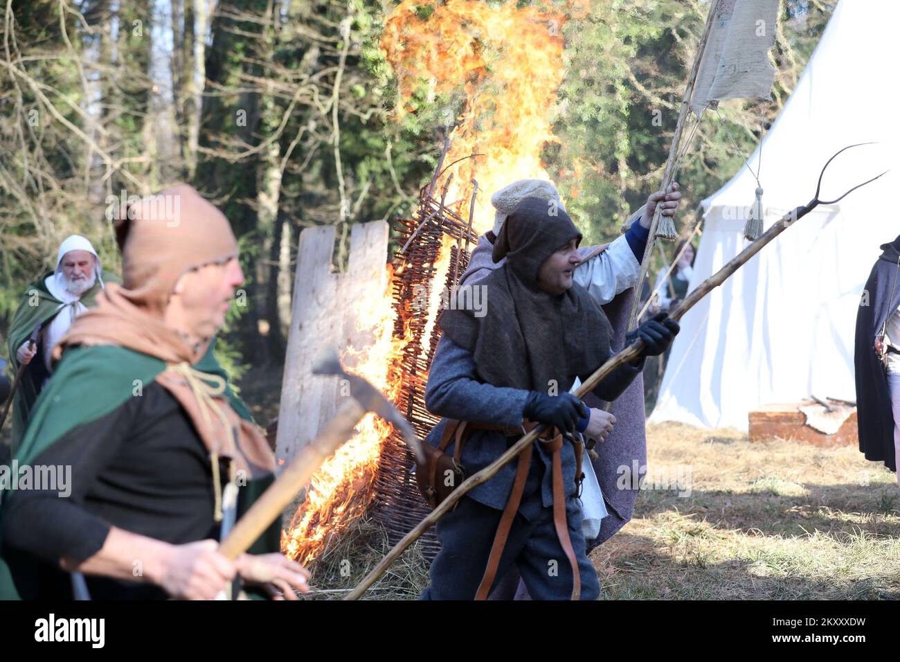 A Locals dressed in medieval clothes participates in a re-enactment of ...