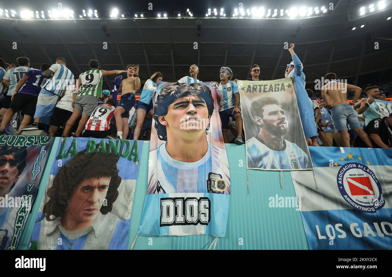 Doha, Qatar. 30th Nov, 2022. Fans of Argentina celebrate team's victory ...
