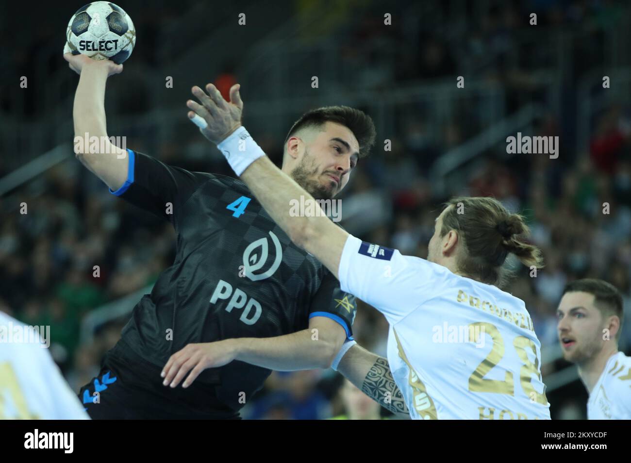 Filip Vistorop of PPD Zagreb in action against Pavel Horak of Kiel during EHF Champions League ...