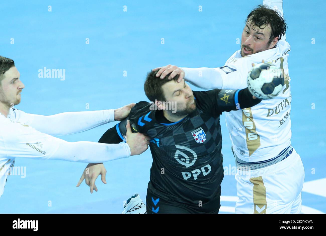 Ivan Cupic of PPD Zagreb in action against Domagoj Duvnjak of Kiel ...