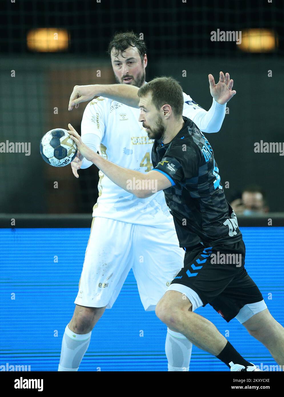 Sandro Obranovic of PPD Zagreb in action against Domagoj Duvnjak of Kiel during EHF Champions ...