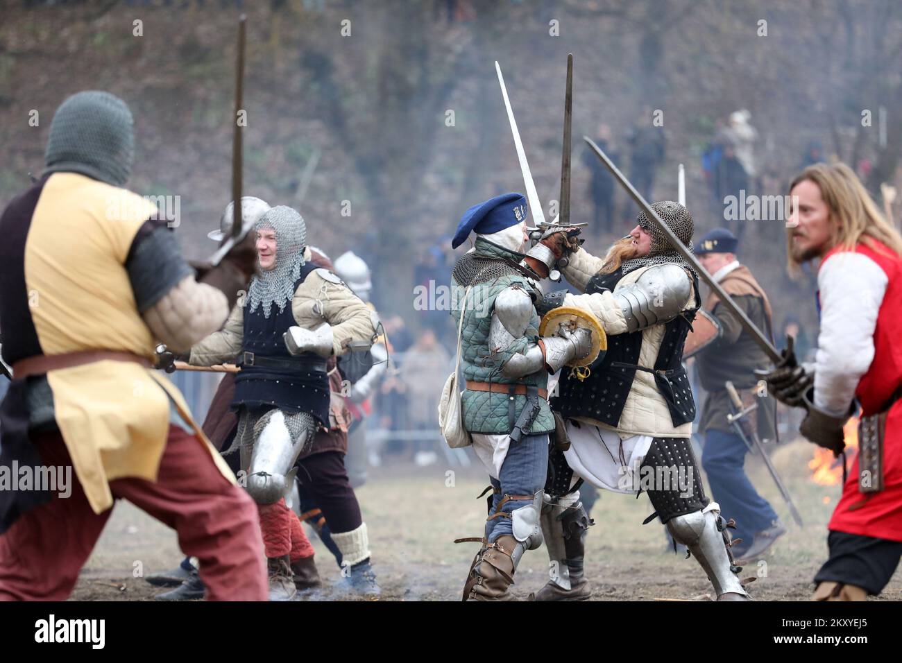 Actors re-enact a medieval battle in Samobor, Croatia, on March 6, 2022 ...