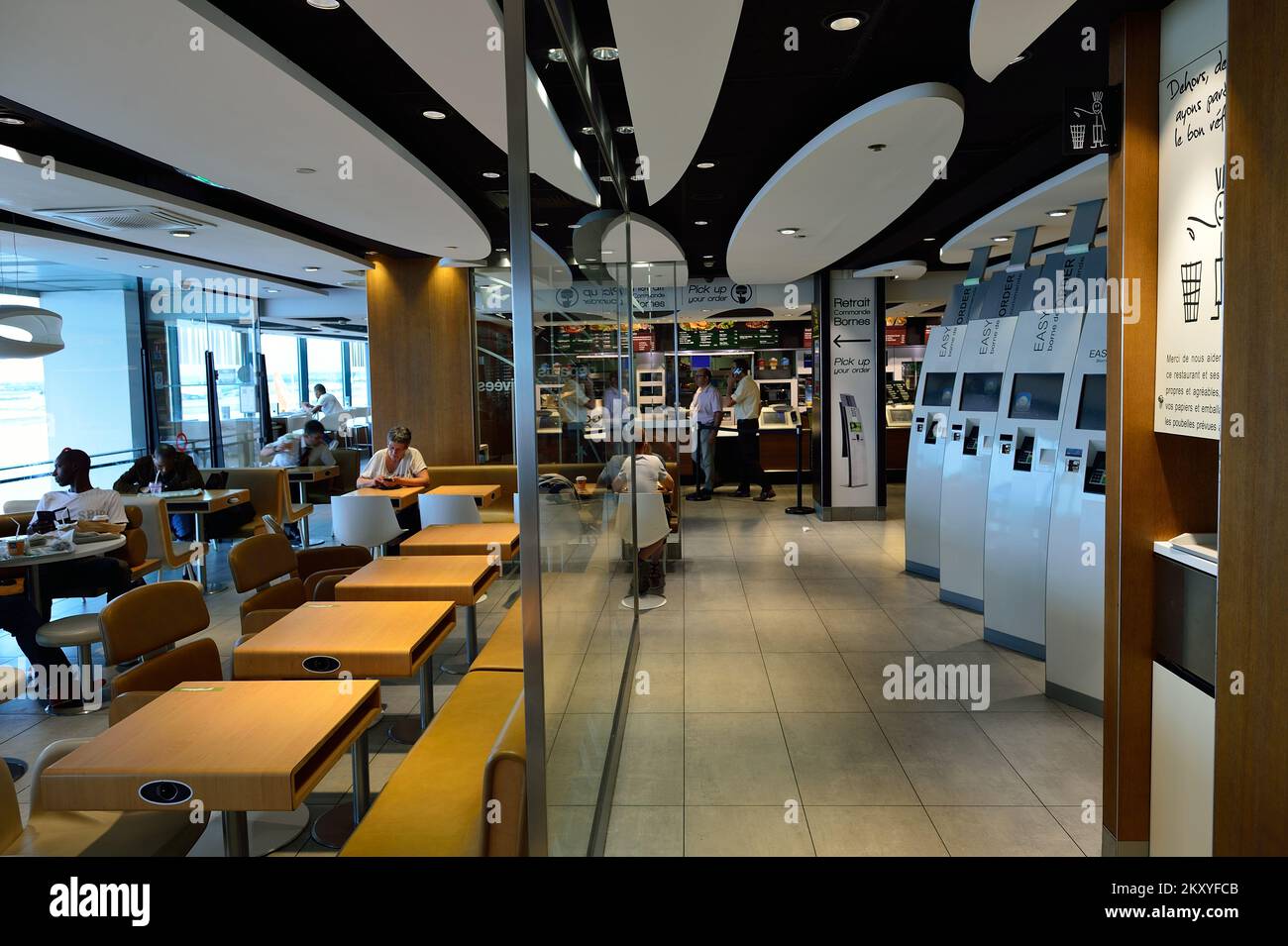PARIS - AUGUST 08, 2015: McDonald's restaurant interior. McDonald's is ...