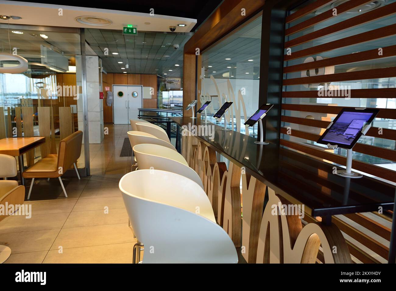 PARIS - AUGUST 08, 2015: McDonald's restaurant interior. McDonald's is ...