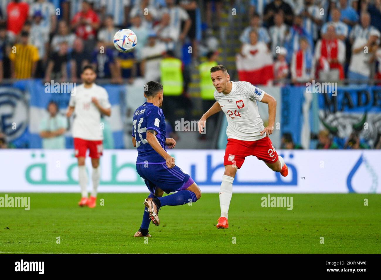 Doha, Qatar. 30th Nov, 2022. Thiago Almada of Argentina and Przemys?aw ...