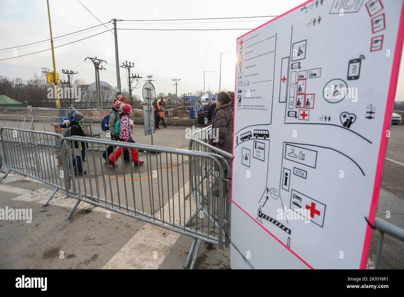 Refugees from Ukraine arrive at a border crossing in Vysne Nemecke ...
