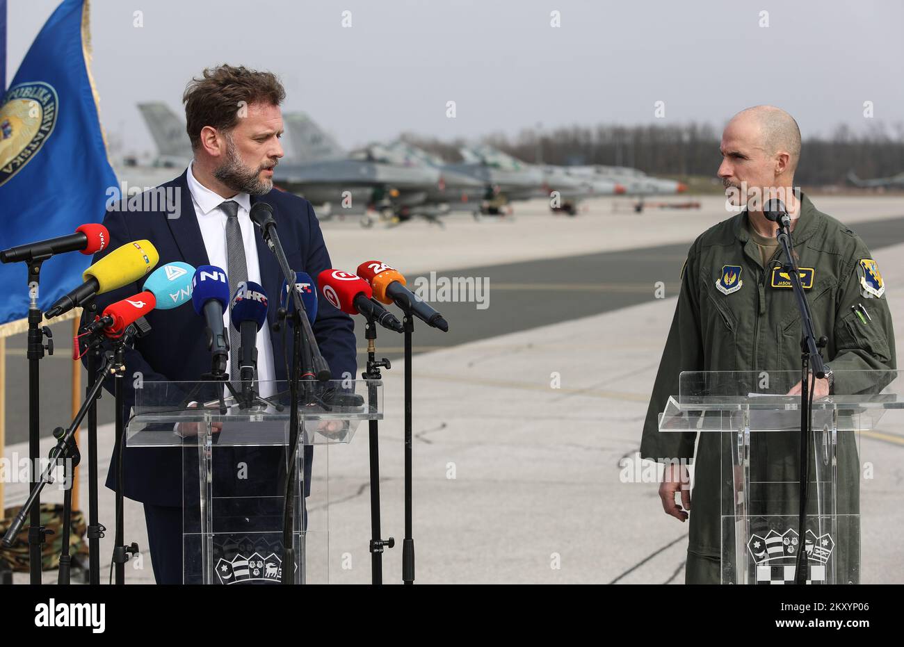 Croatian Minister of Defence Mario Banozic (L) speaks on a press ...