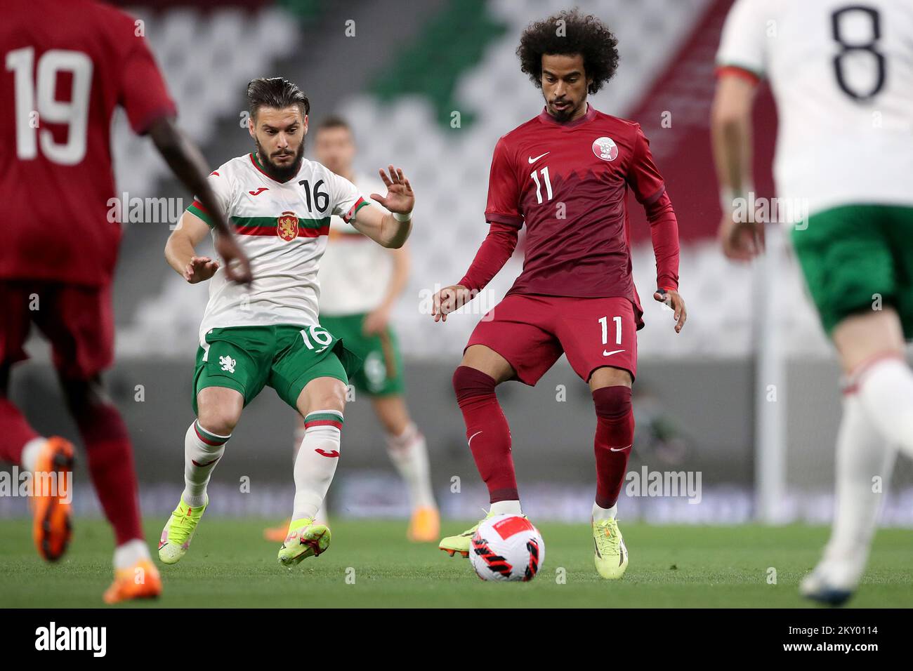 Akram Afif of Qatar in action against Kristiyan MalinovÂ of Bulgaria ...