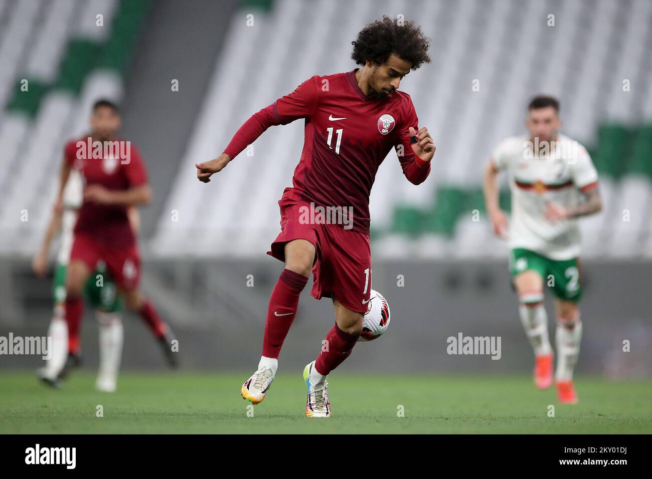 Akram Afif of Qatar in action during the international friendly match ...