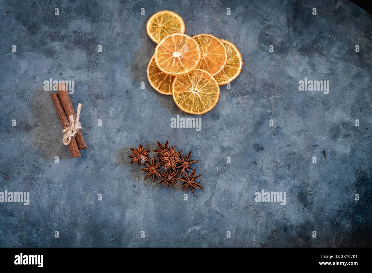 Christmas composition with sliced of dried oranges, anise stars and ...