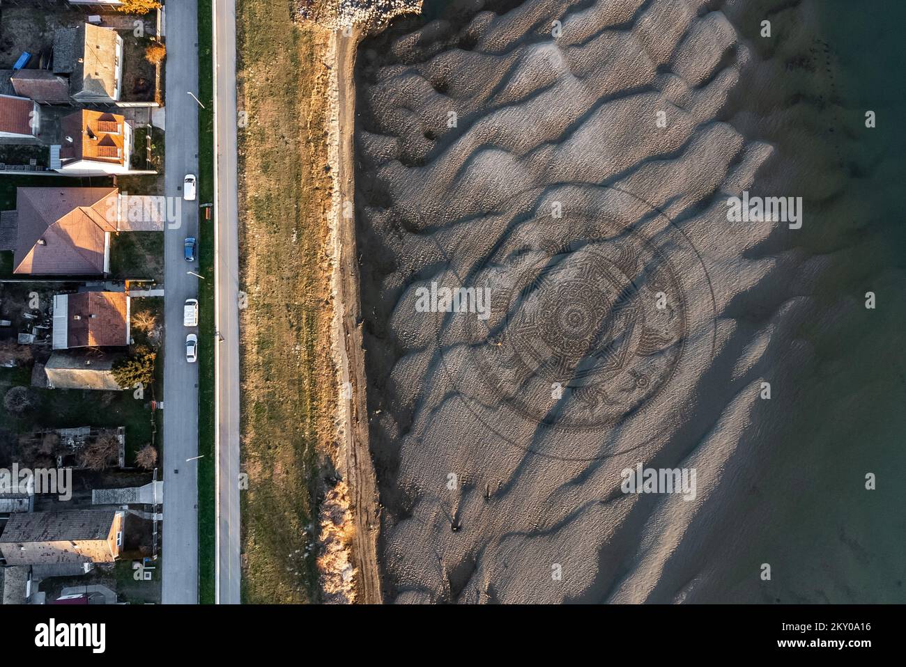 Aerial photo of sand drawing made by artist Nikola Faller at Drava ...