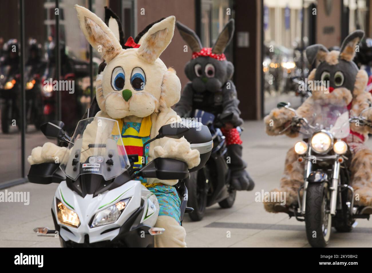 People dressed as the Easter Bunnies ride motorbikes during Easter Moto ...