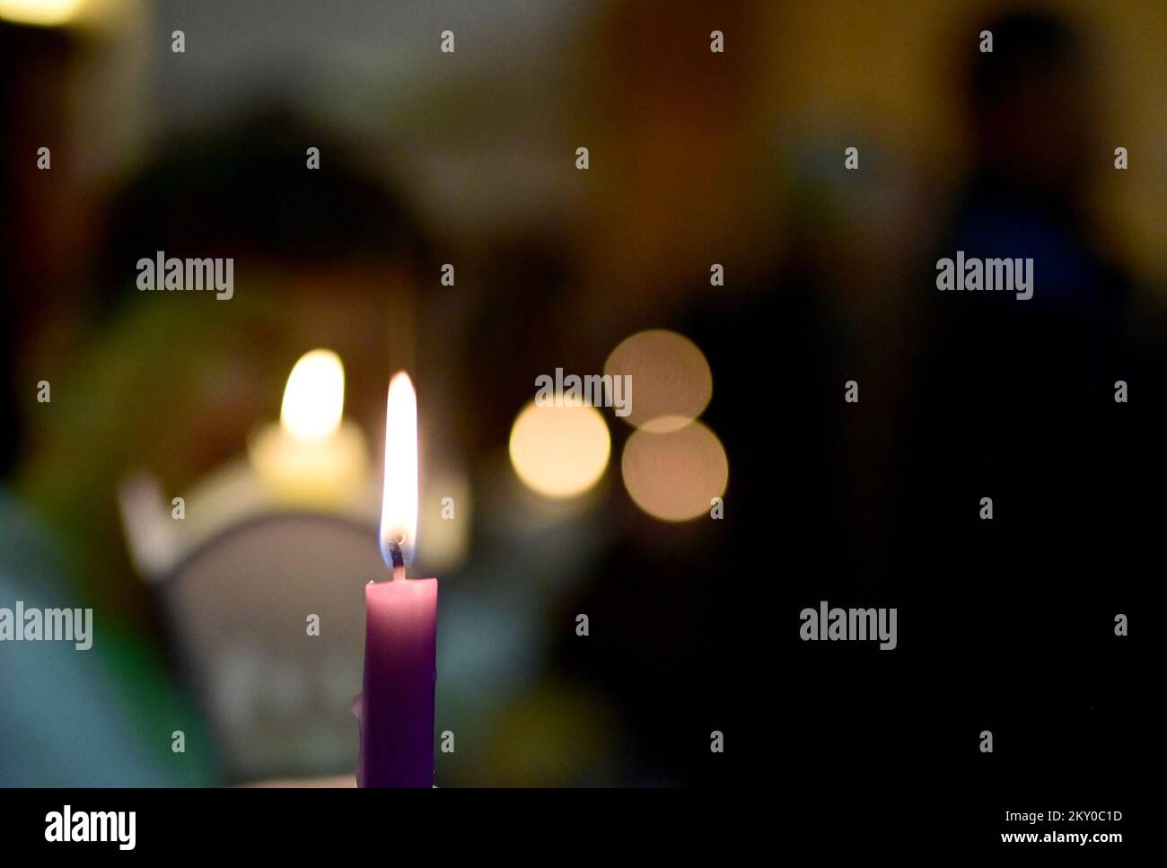 Candles are carried during Catholic procession as part of the holy fire ...
