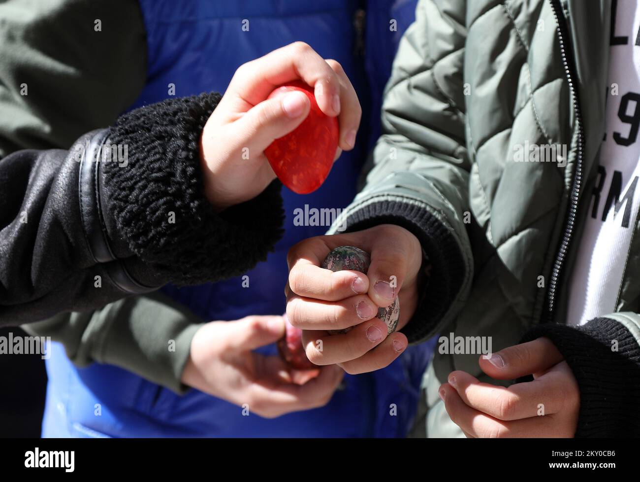 Children tap eggs during 10th Easter egg tapping tournament in Vodice ...