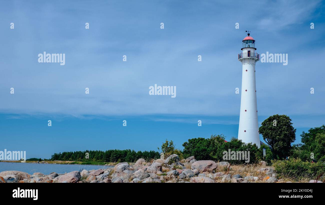 Beautiful lighthouse in a small village in clear weather Stock Photo ...