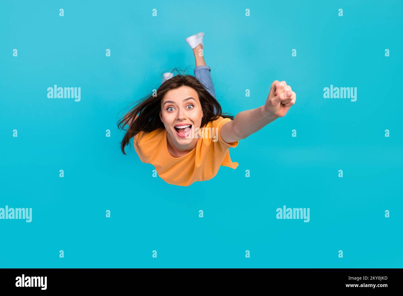 Photo of positive overjoyed girl activist rescuer flying help save ...