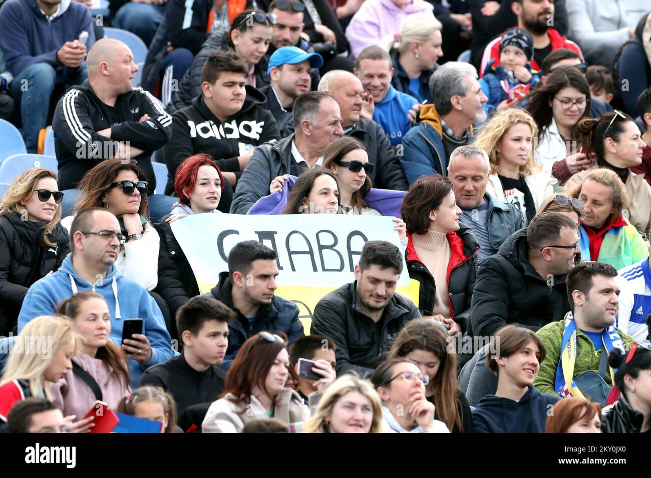 Fans in the stands holding banner 'Slava Ukraini' during the ...