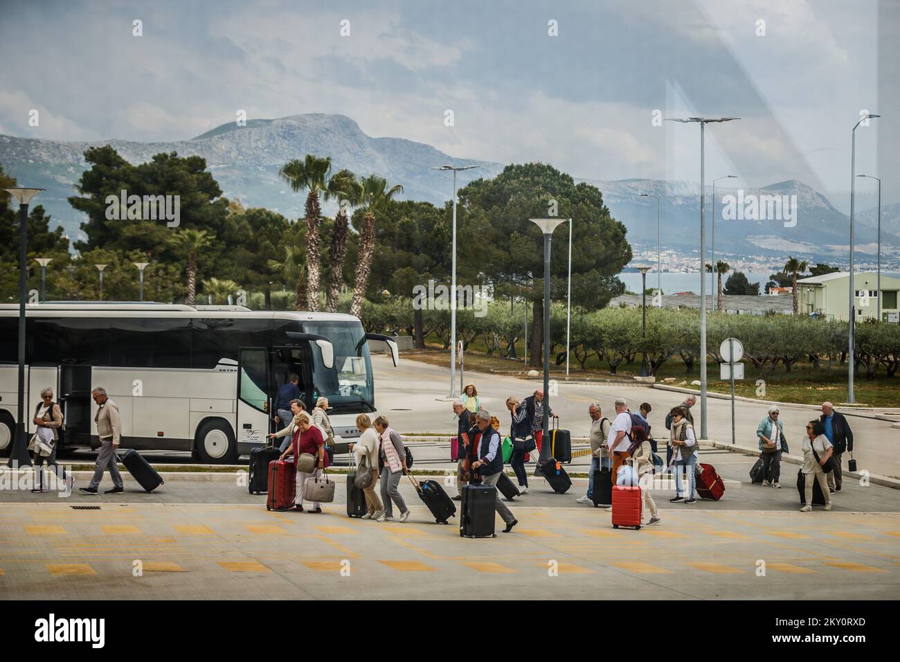 Passengers can be seen in the building of Split Airport Kastela. Today ...