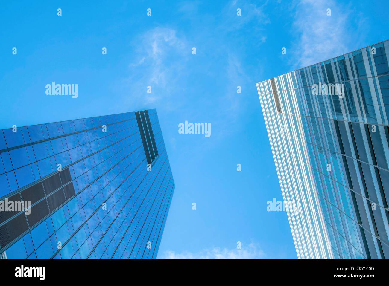 Glass buildings towering under the bright blue sky in downtown Austin ...