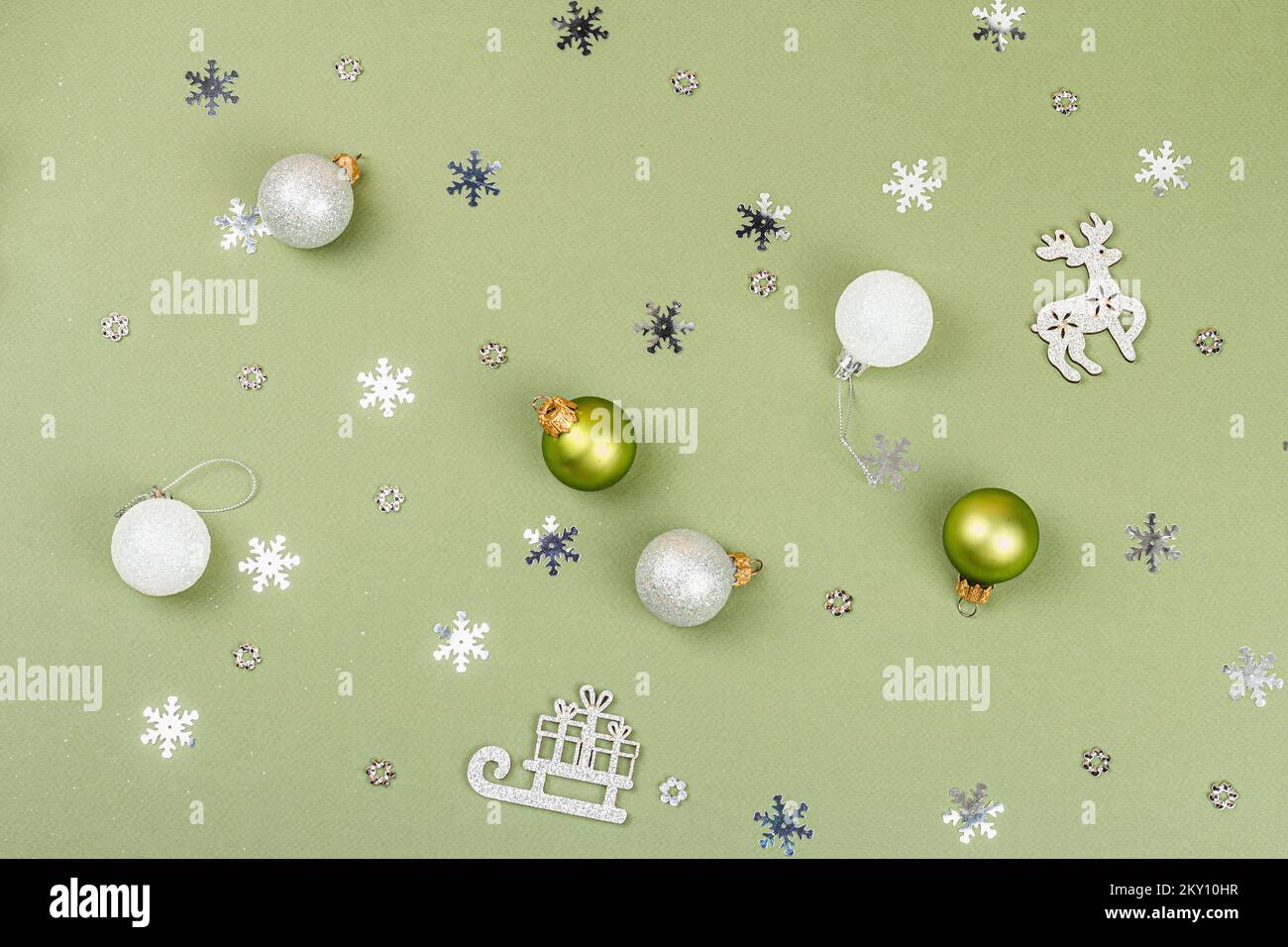 New Year festive background. Christmas balls, shiny snowflakes and ...