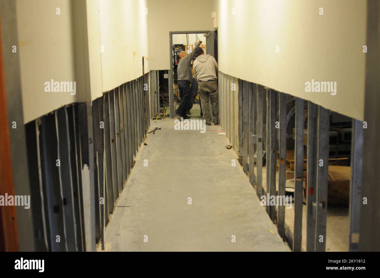 Workmen Cut Out Walls at Flood Damaged Commercial Building. New Jersey ...
