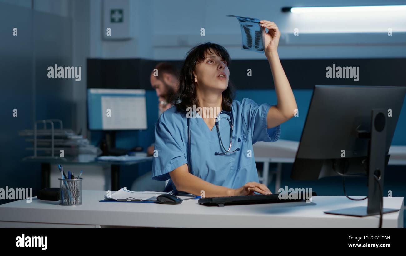 Checking symptoms on computer hi-res stock photography and images - Alamy