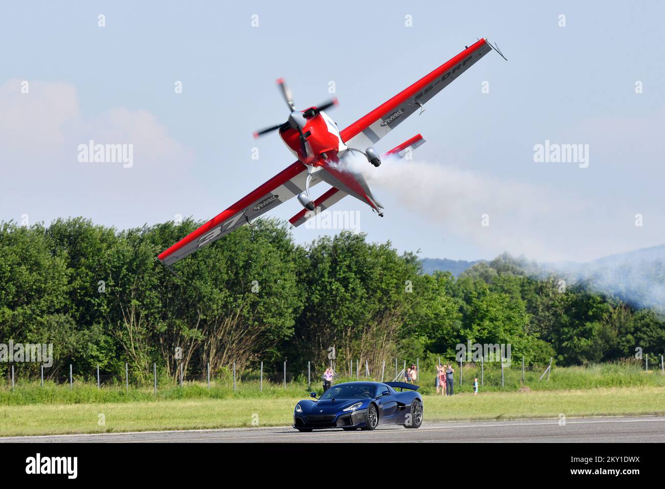 Peter Podlunsek, an experienced Red Bull acrobatic pilot, flew over ...