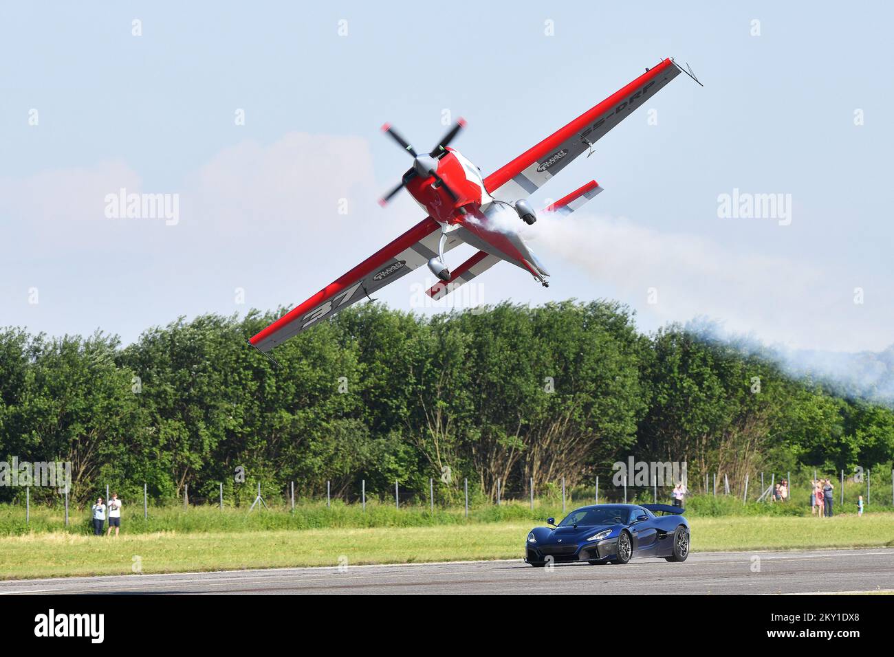 Peter Podlunsek, an experienced Red Bull acrobatic pilot, flew over ...