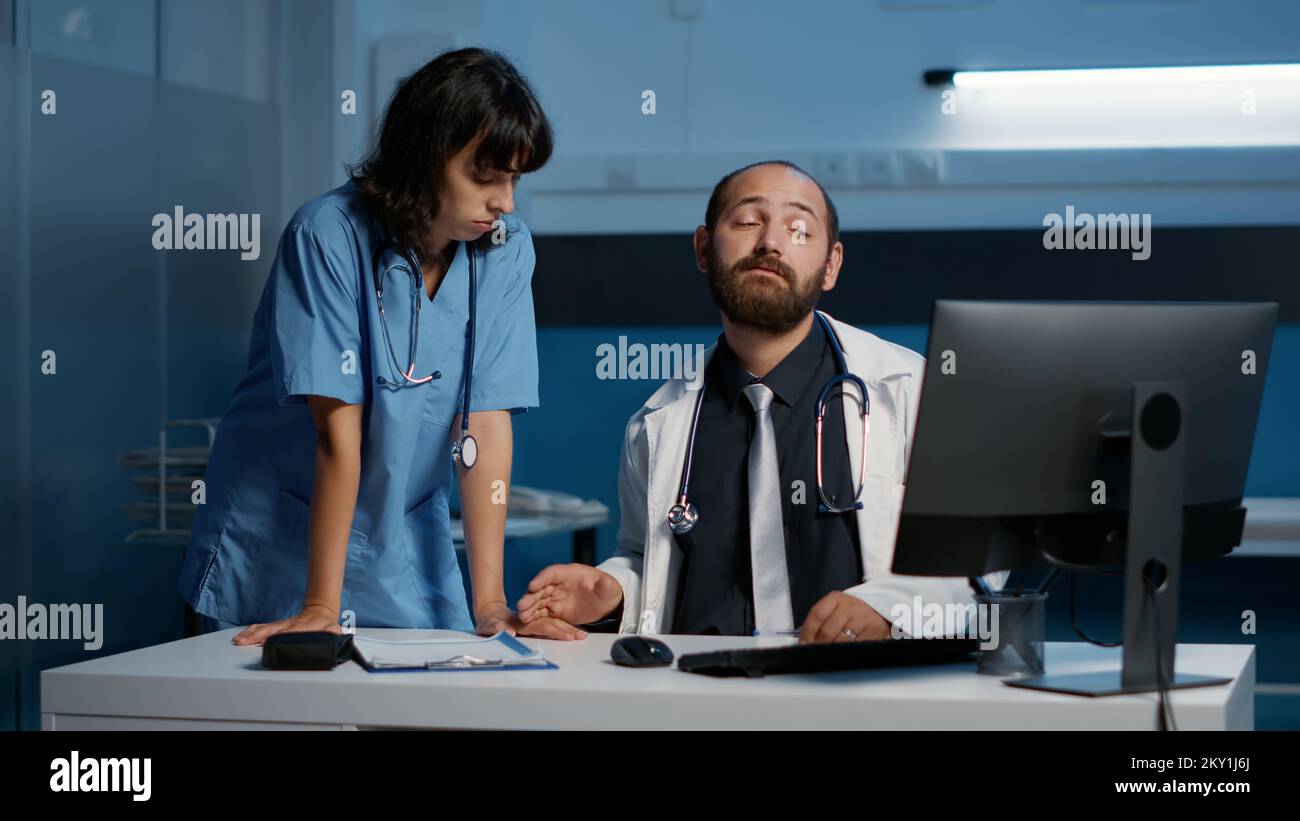 Medical nurse working late at night while being touched inappropriately ...