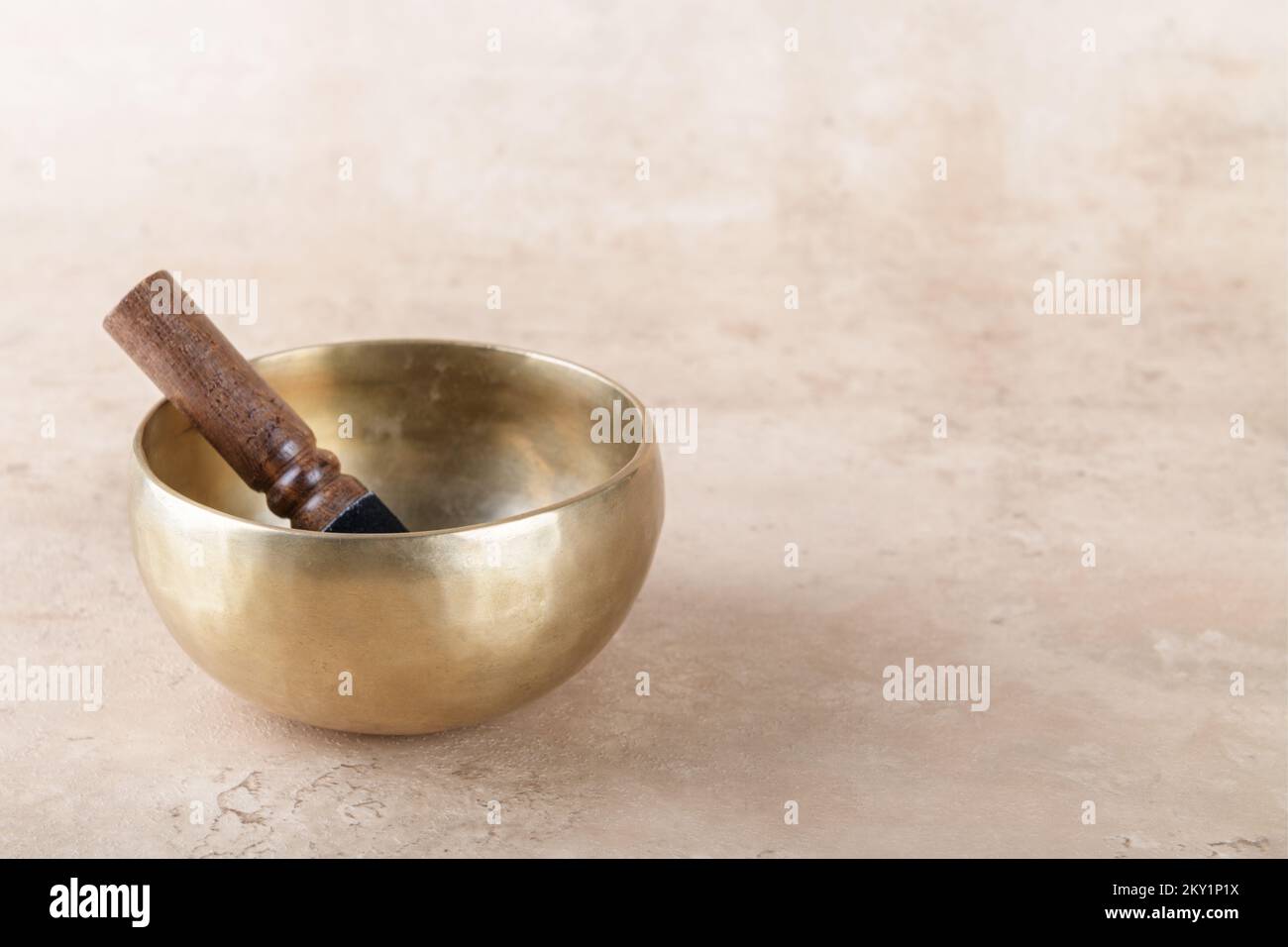 Tibetan singing bowl during meditation hi-res stock photography and ...