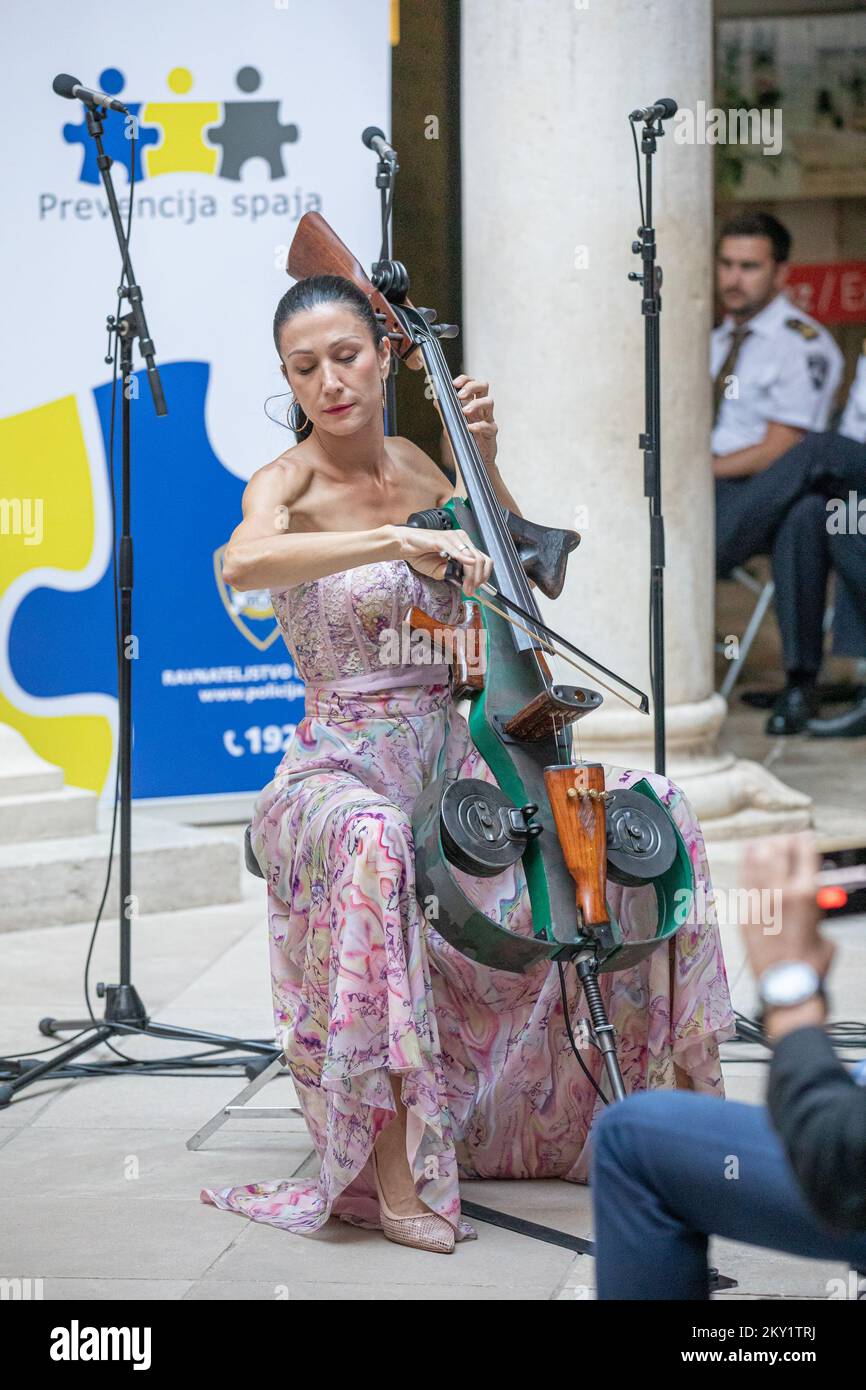 Cellist Ana Rucner playing cello made from weapons in Rector's Palace ...
