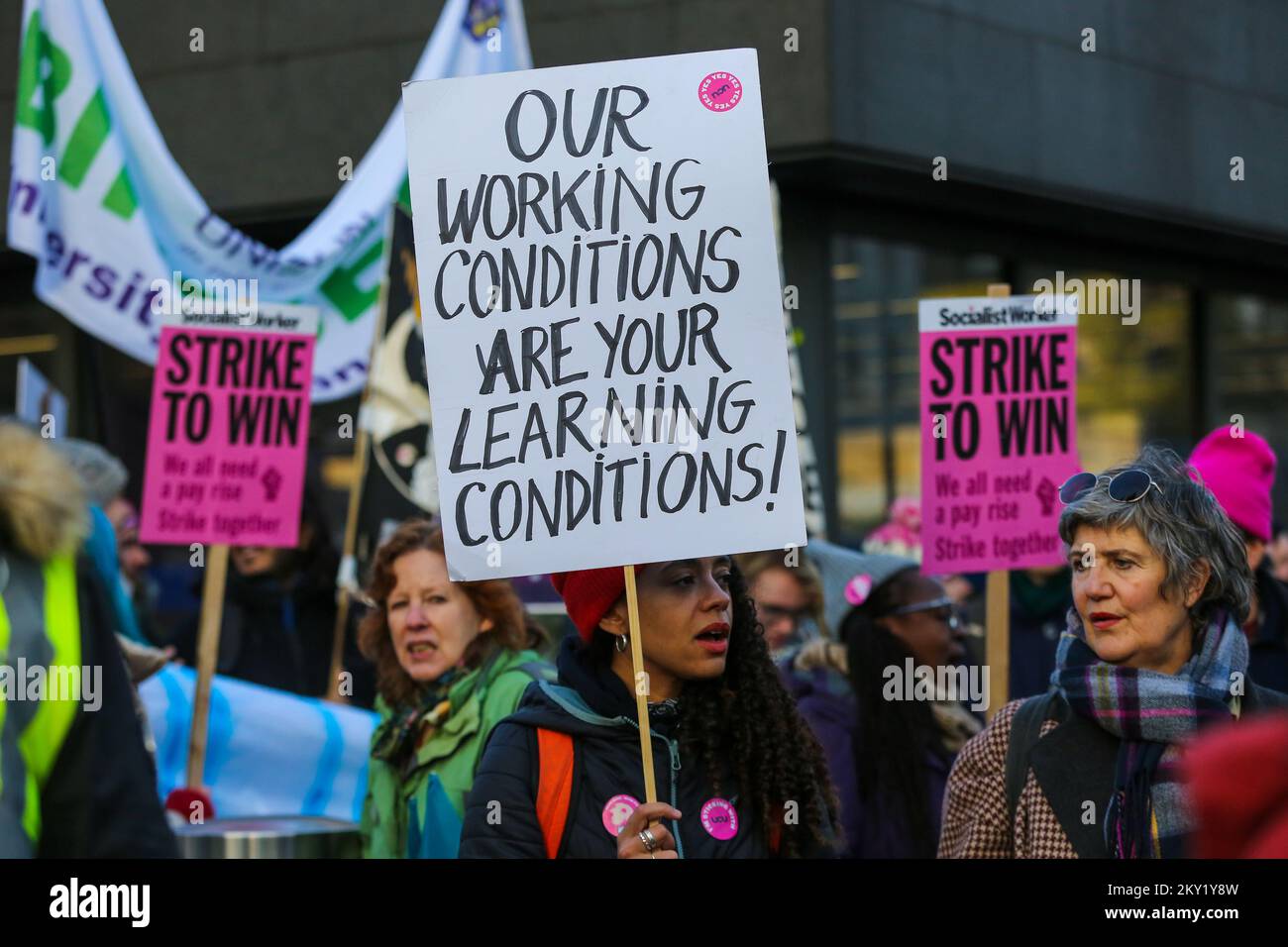 The University and College union members and students hold placards ...