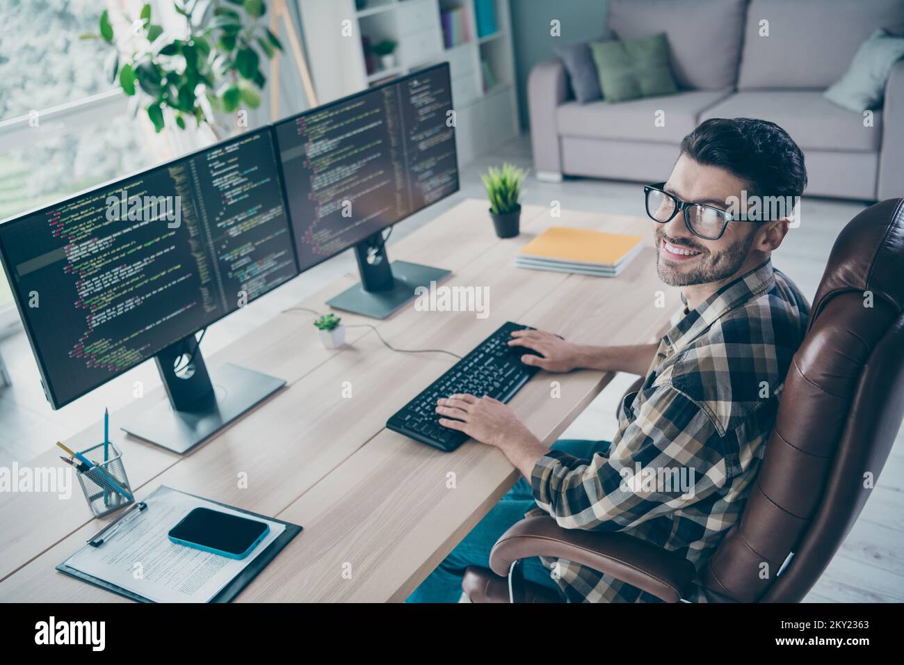 Photo of positive cheerful programmer wear spectacles smiling web ...