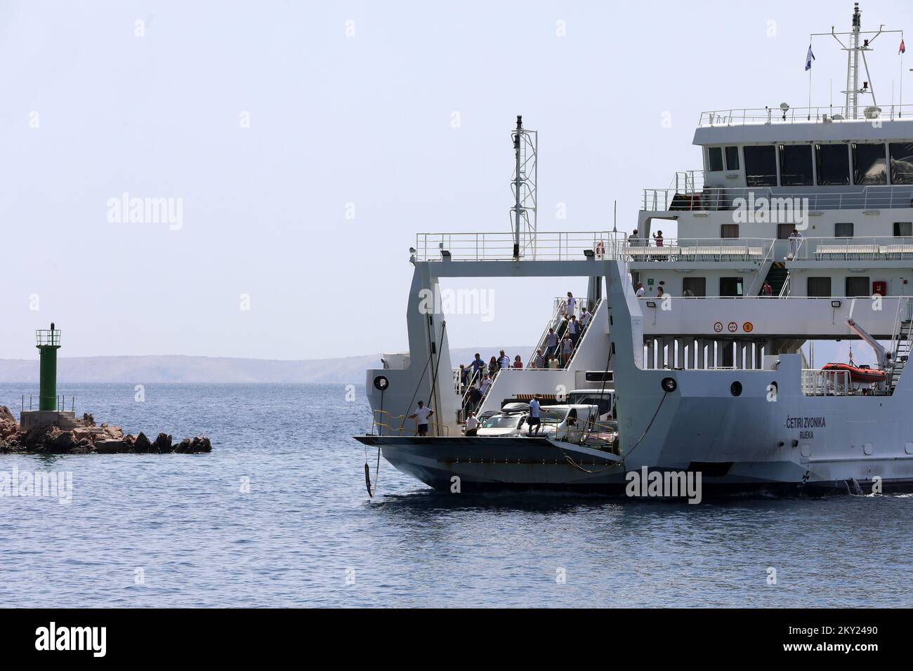 The Rabska plovidba ferry "Cetiri zvonika" with tourists docks in the ...