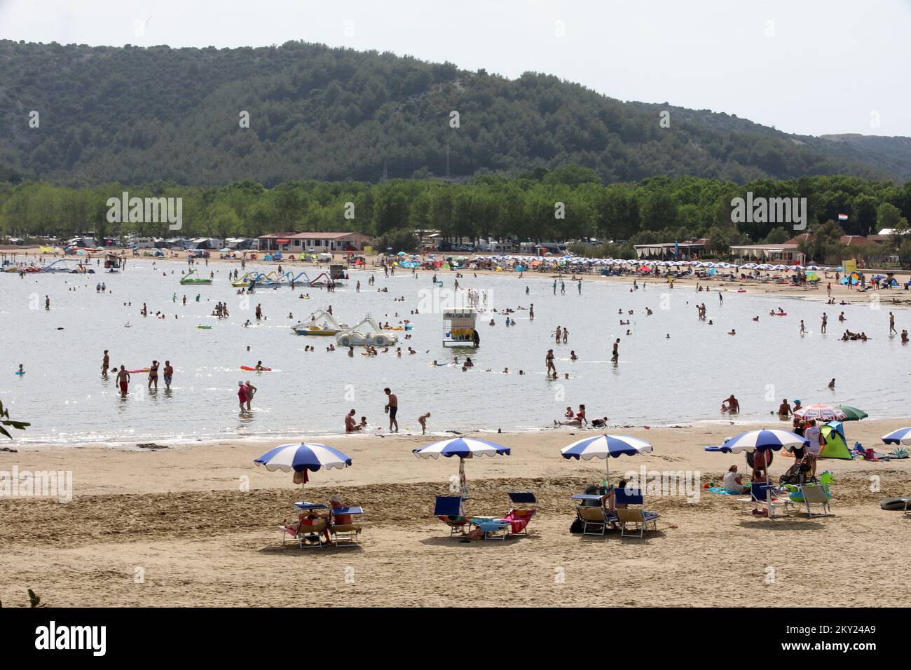 The sandy Paradise Beach (Rajska plaza) is crowded with bathers in ...