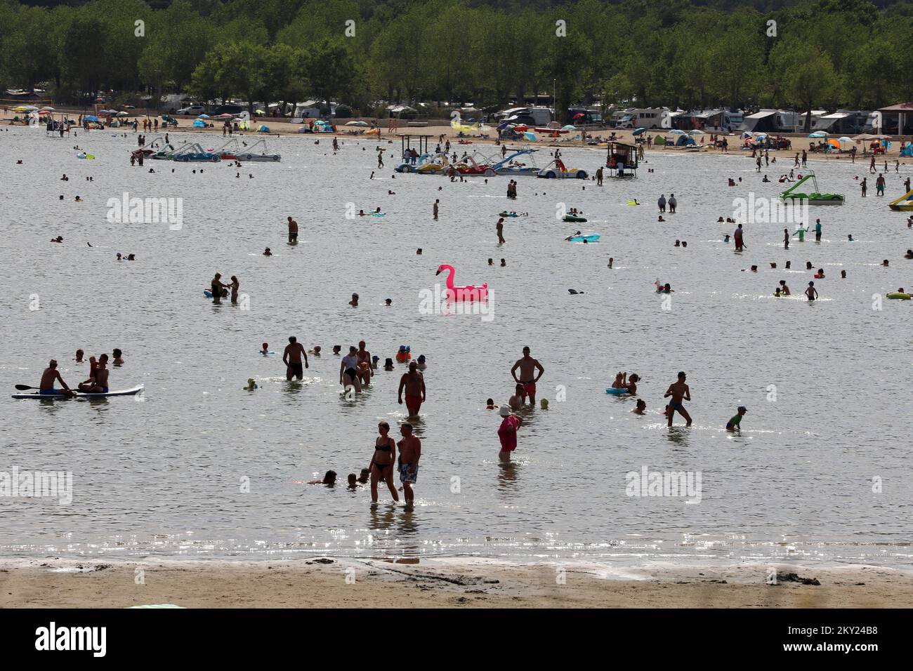 The sandy Paradise Beach (Rajska plaza) is crowded with bathers in ...