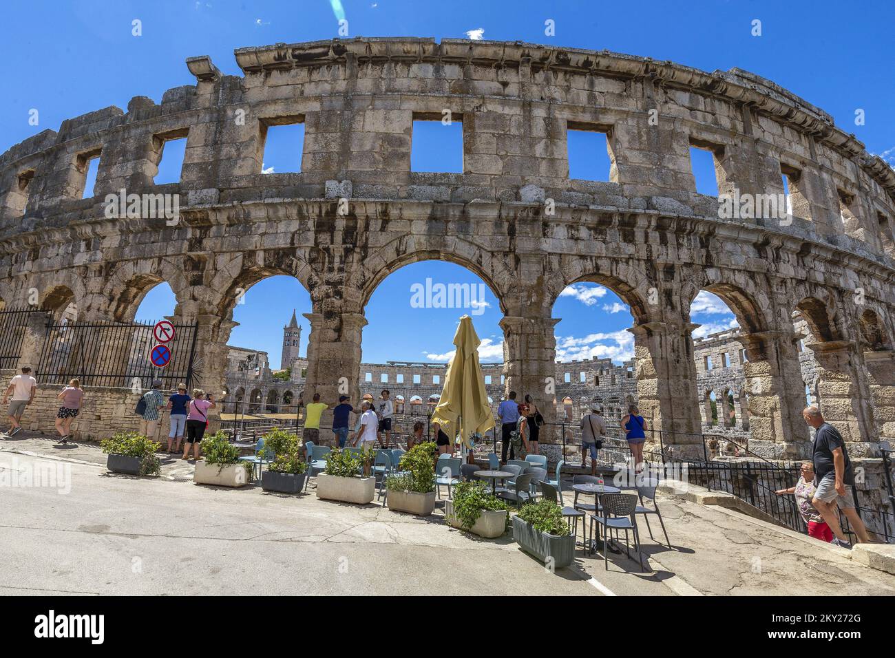 Tourists seen visiting the Pula Arena , Roman amphitheatre located in ...