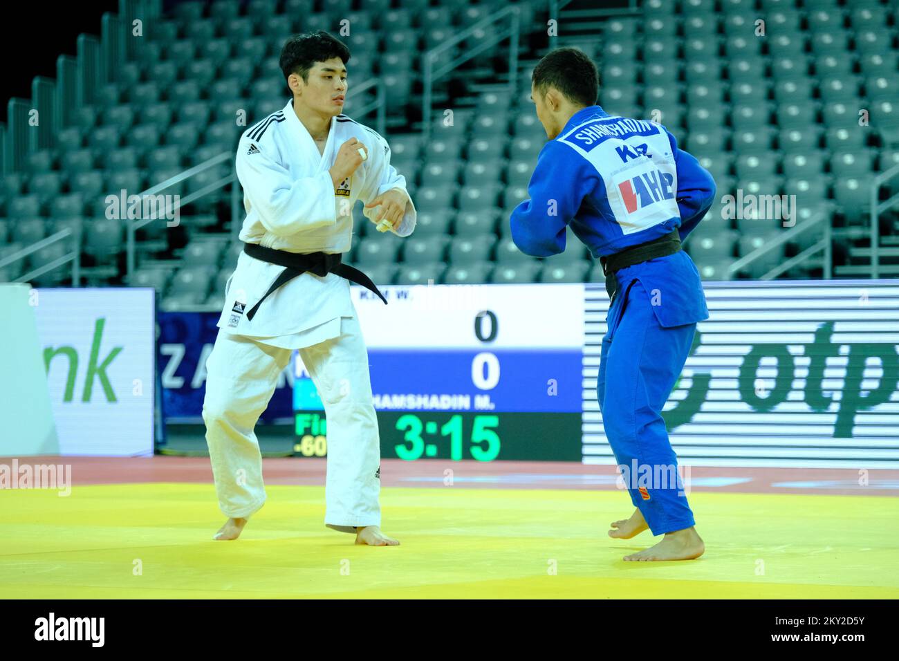 Won Jin Kim of South Korea fights against Magzhan ShamshadinÂ of ...