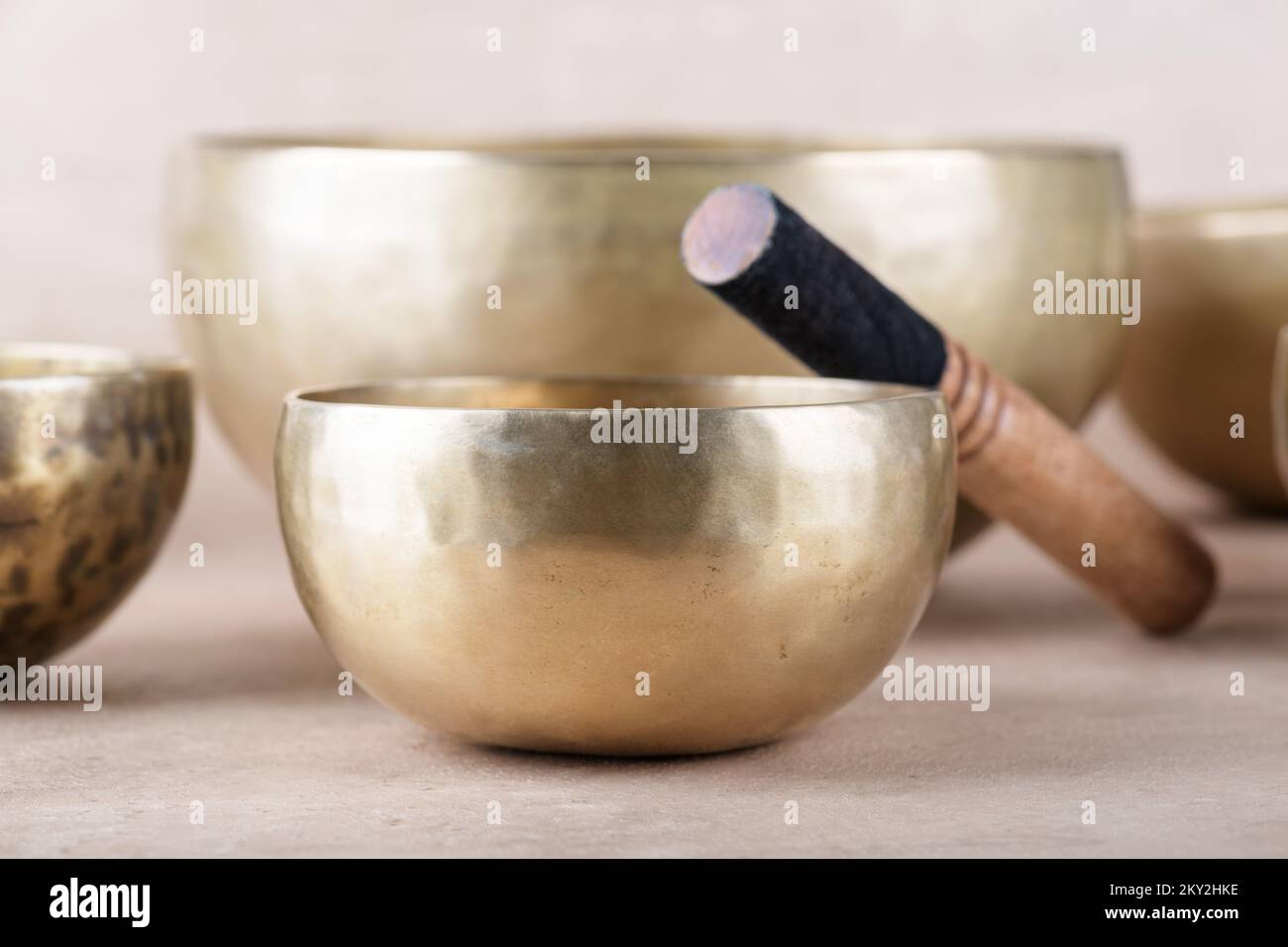 Tibetan singing bowls with sticks used during mantra meditations on ...
