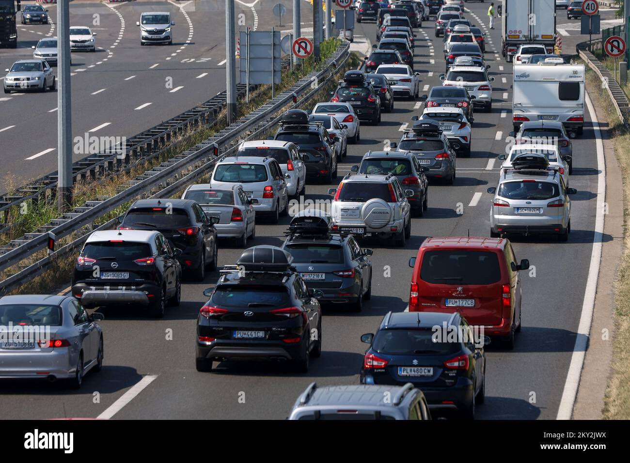 Vehicles are seen in queue at Lucko A1 motorway toll station near ...