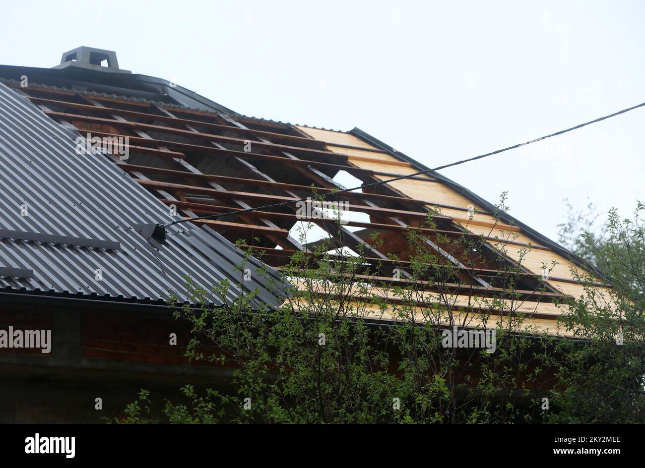 A storm with rain and strong wind brought down trees and roofs in ...