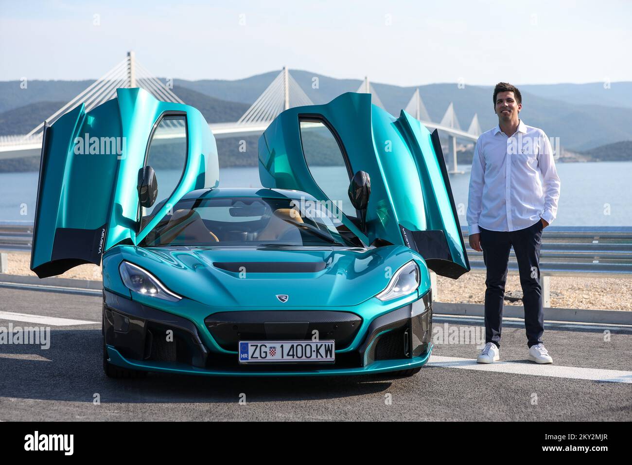 Chief Program Engineer at Rimac Automobili Matija Renic pose next to ...