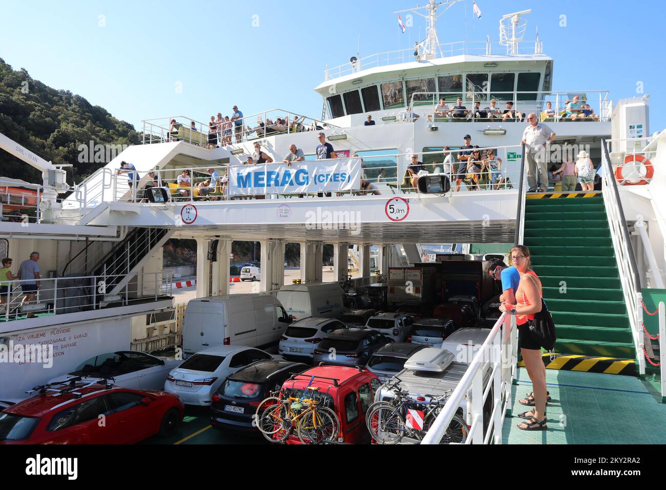 Tourists board the Jadrolinija Kornati and Ilovik ferries at the ...